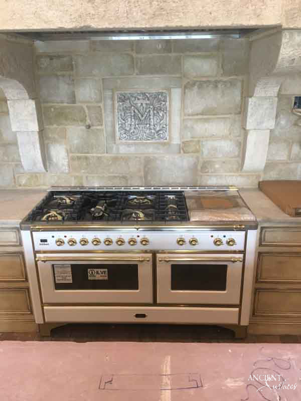 Echoes of Time: The Artisanal Grandeur of Ancient Limestone Kitchen Hoods